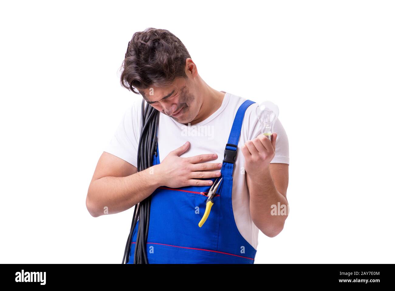 Funny man doing electrical repair Stock Photo - Alamy