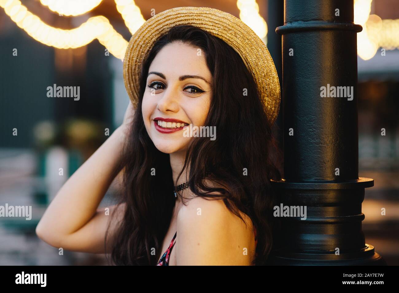 Close up portrait of beautiful female with dark appealing eyes, smiling ...