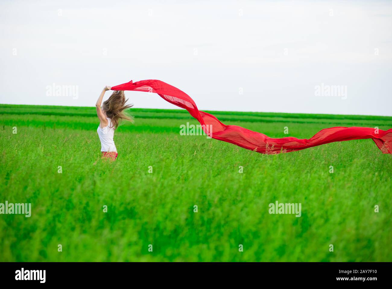 Scarf blowing in wind hi-res stock photography and images - Alamy