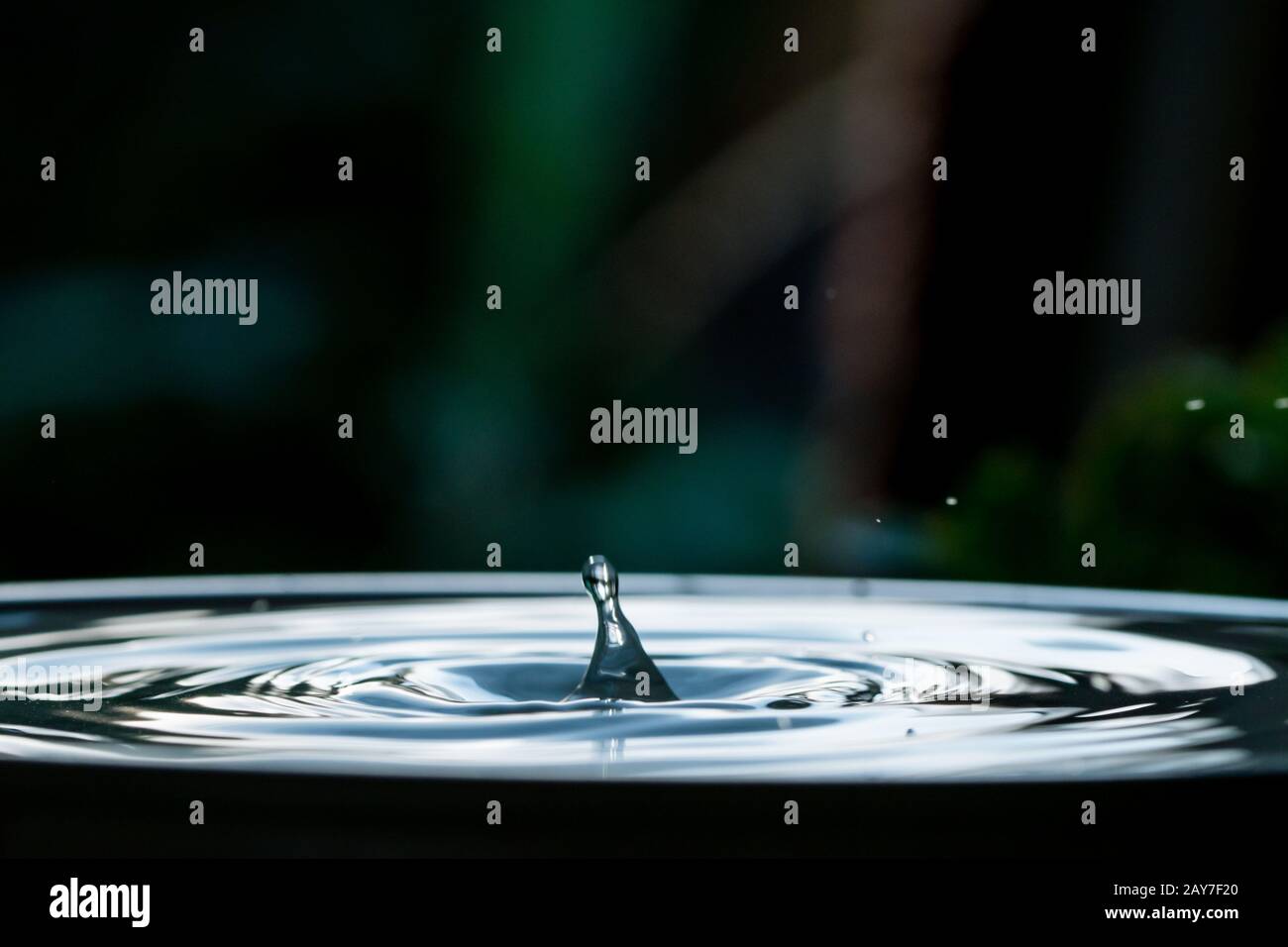 Water Drop splash with sun Stock Photo - Alamy