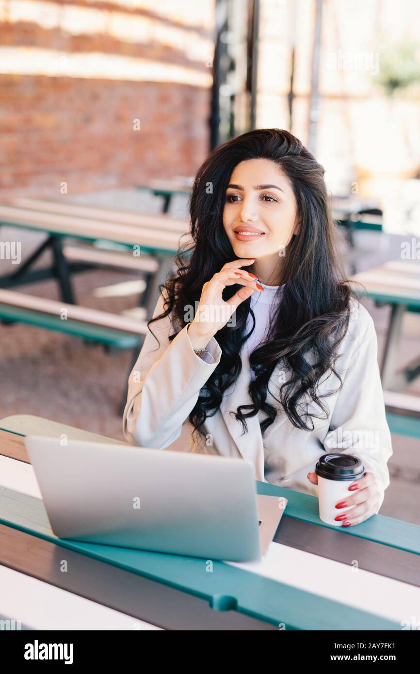 Elegant successful woman freelancer dressed formally using generic ...