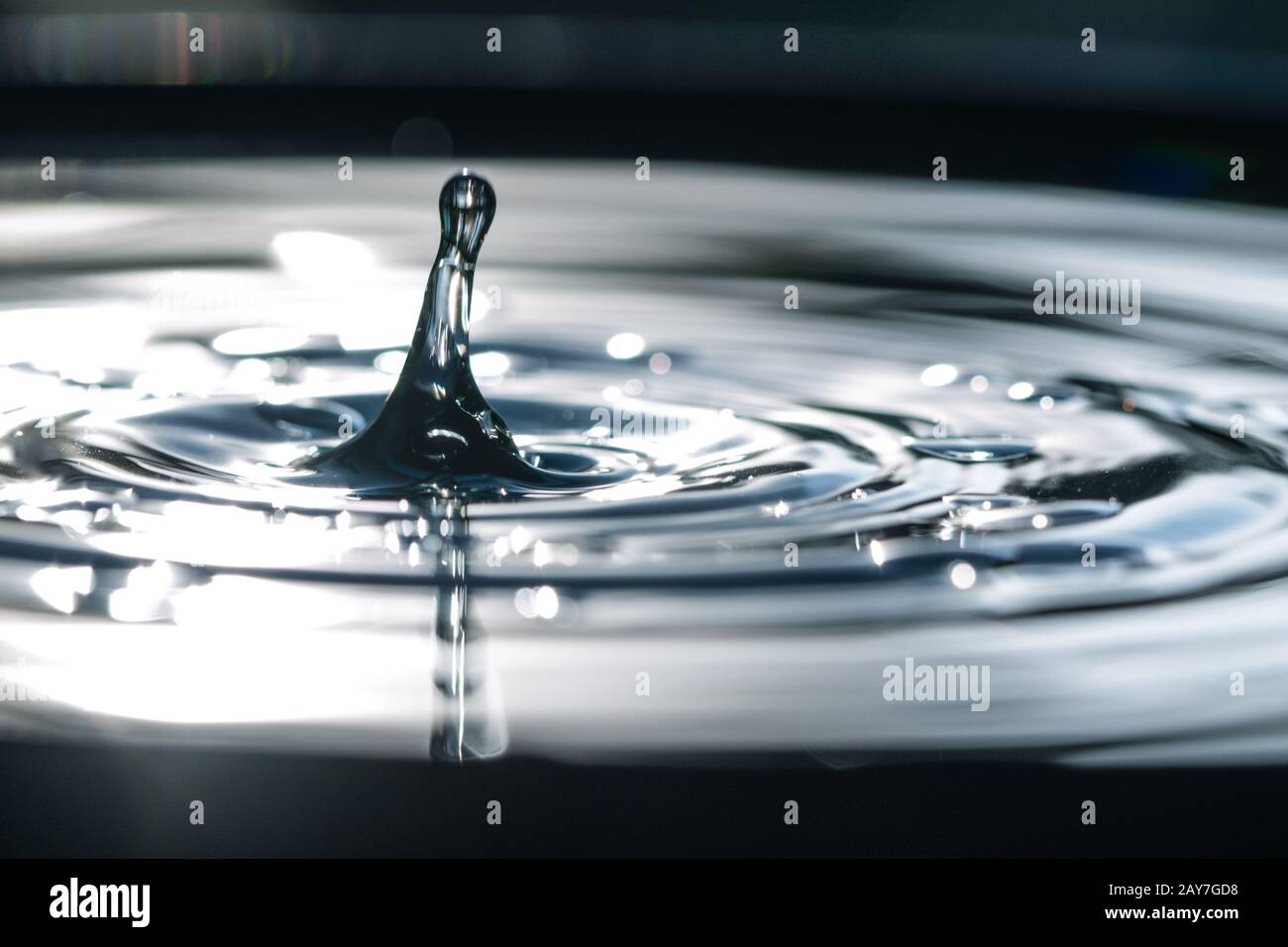 Water Drop splash with sun Stock Photo - Alamy