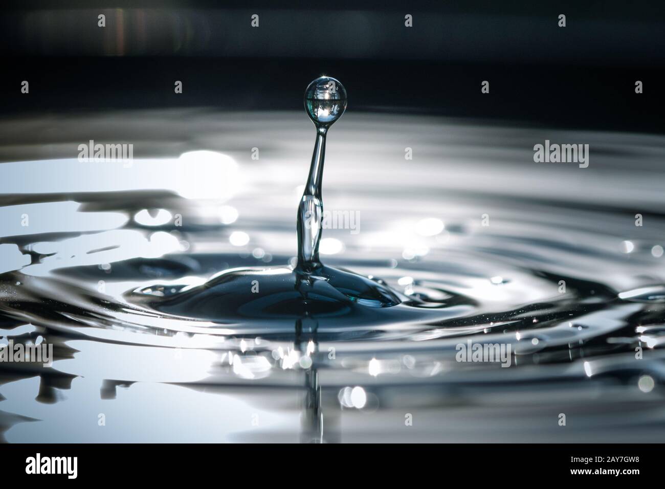 Water Drop splash with sun Stock Photo - Alamy