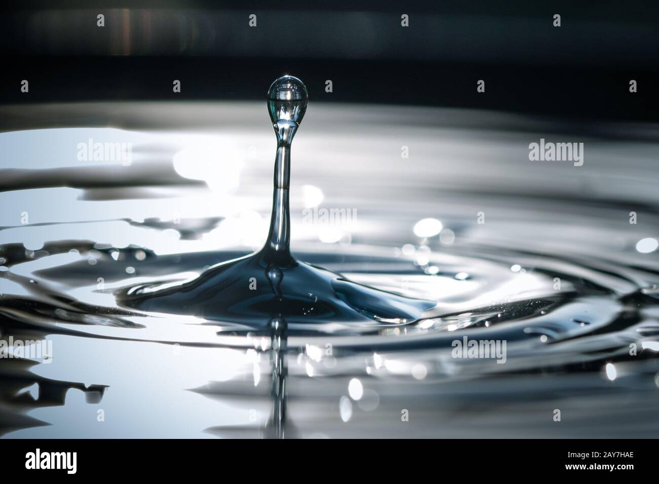 Water Drop splash with sun Stock Photo - Alamy