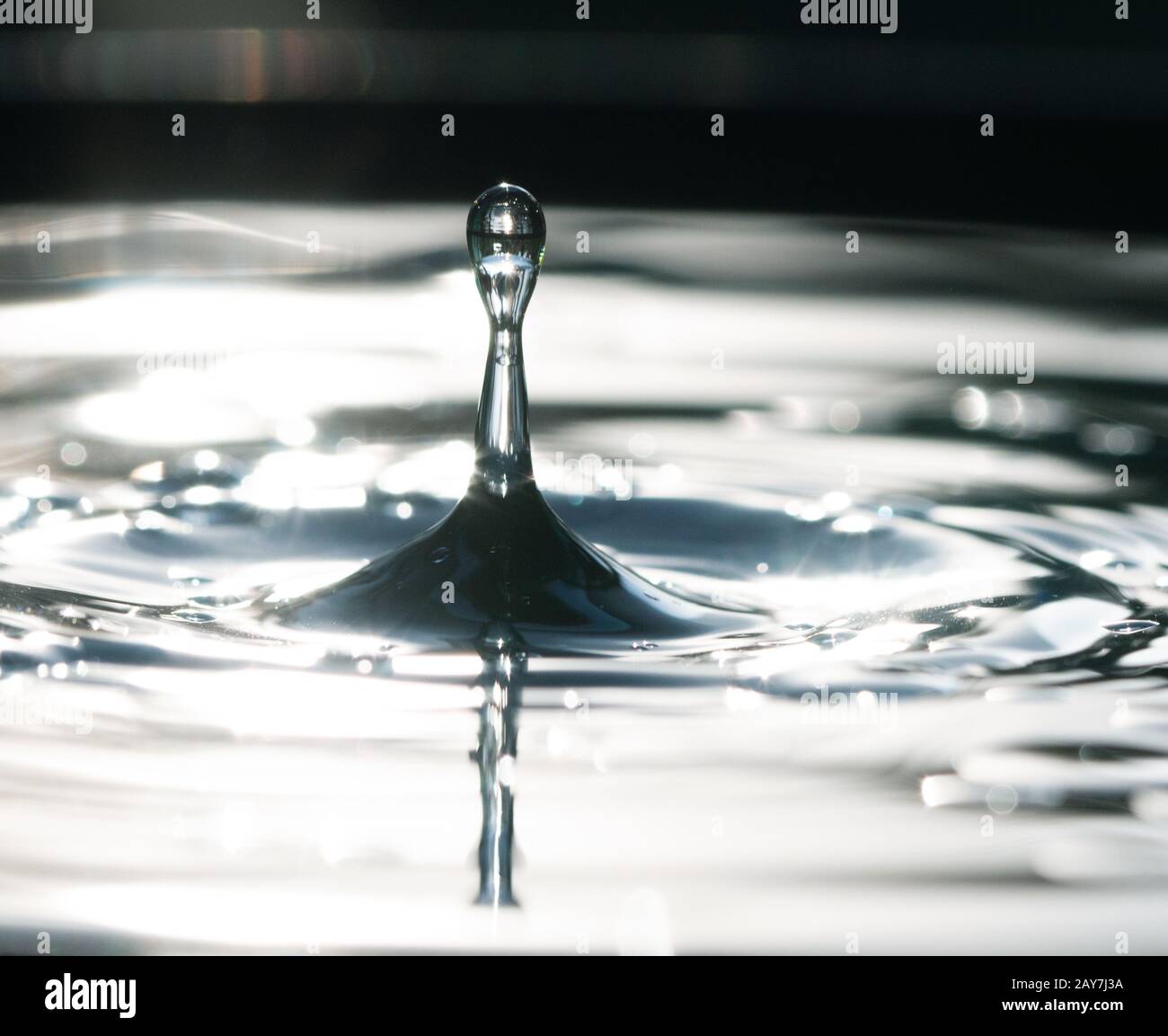 Water Drop splash with sun Stock Photo - Alamy