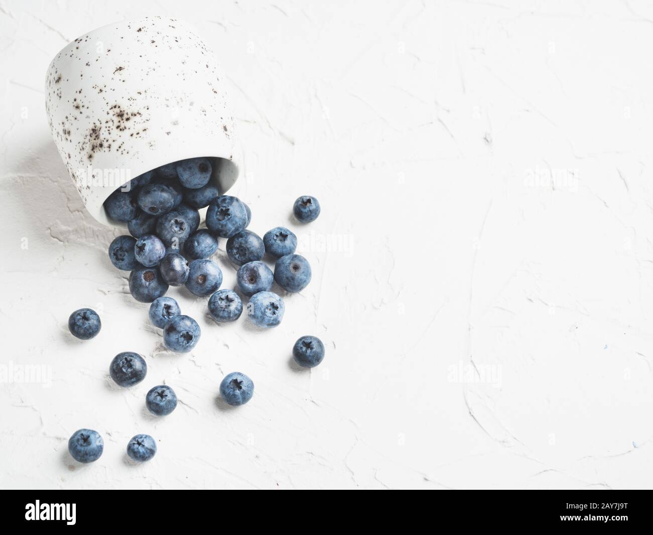 Blueberry scattered with copy space Stock Photo - Alamy