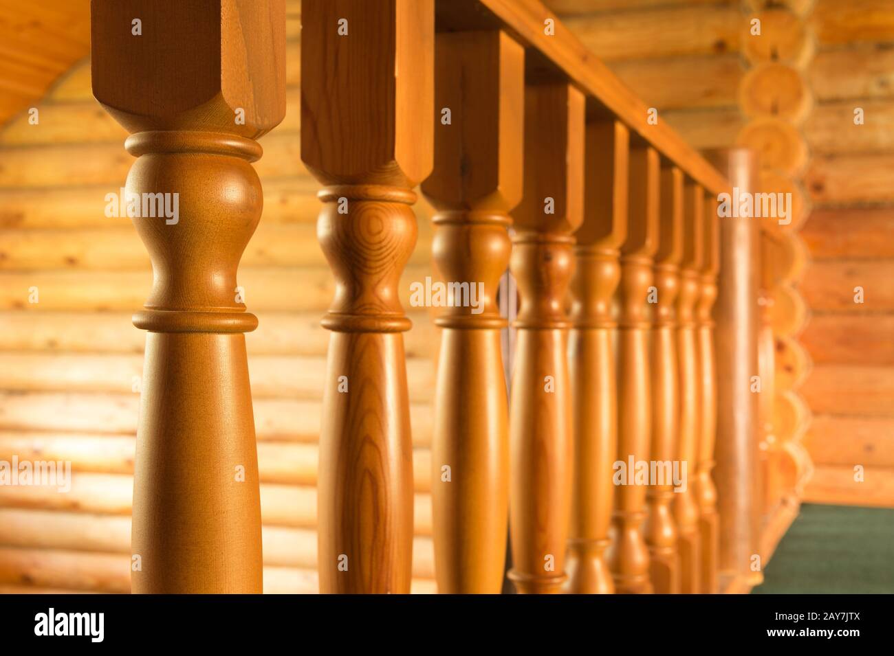 Close-up row of wooden column wooden stairs in wooden blockhouse house ...