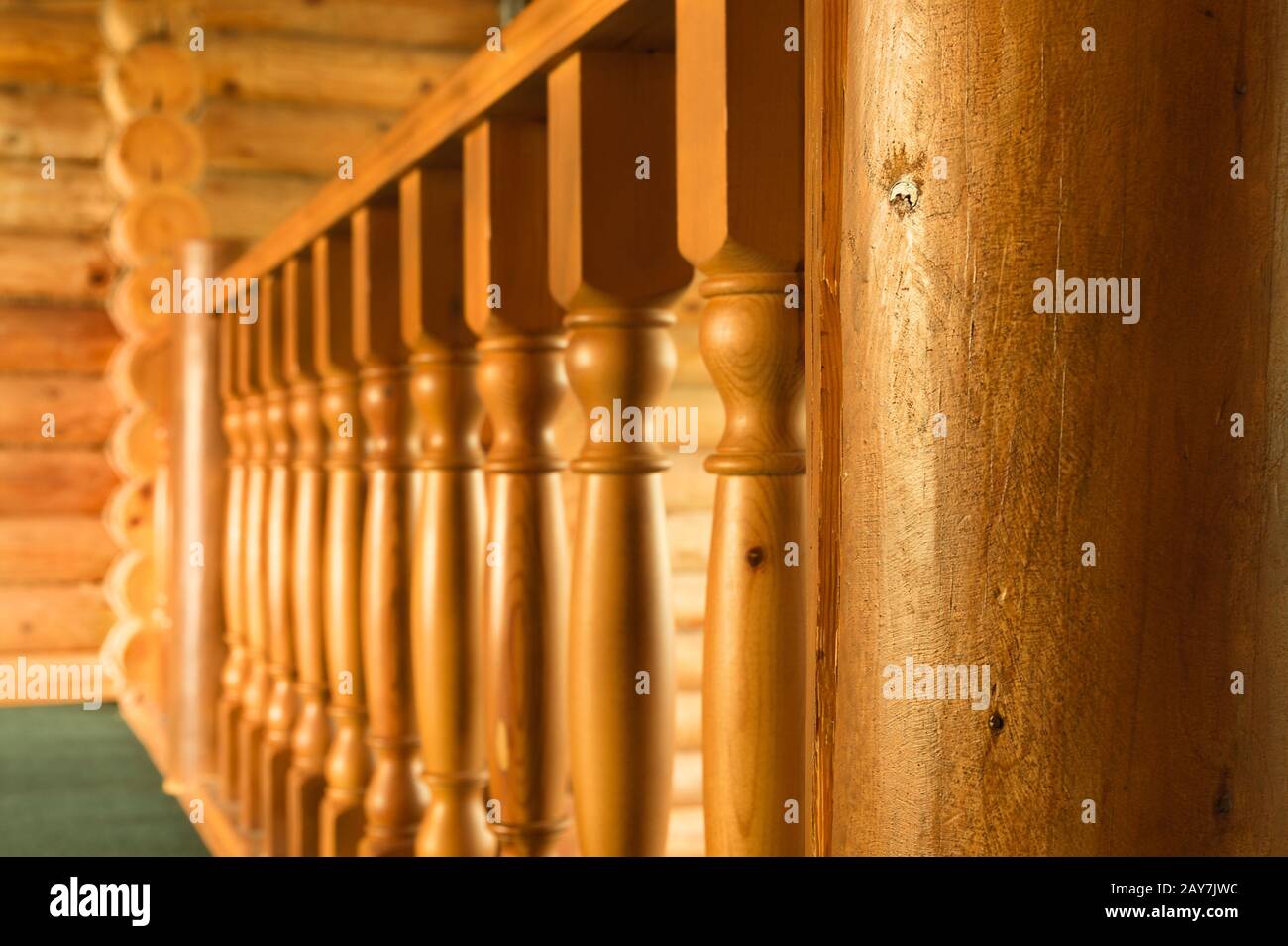 Close-up row of wooden column wooden stairs in wooden blockhouse house ...