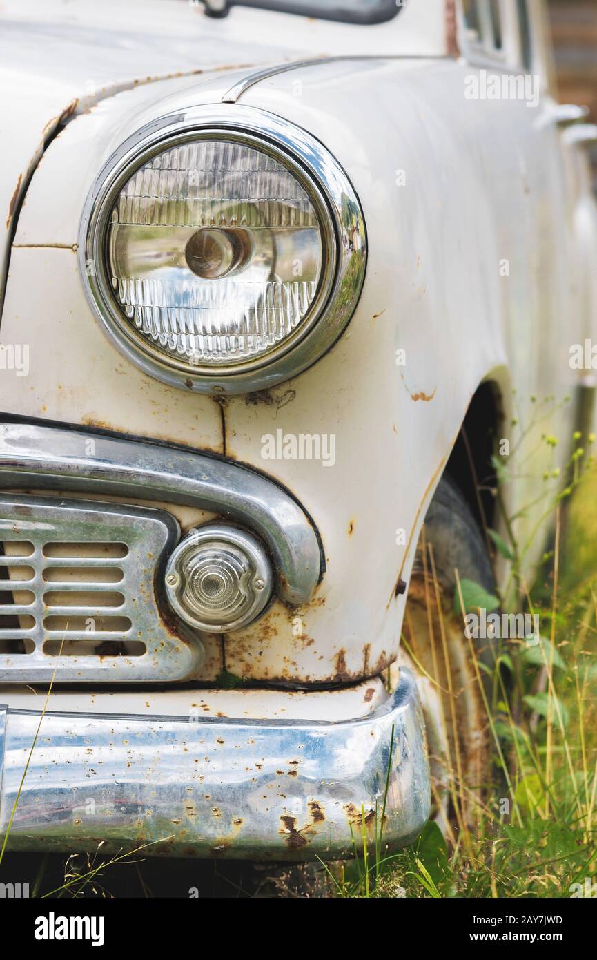 The old rusted machine. Front view where there is a spotlight with a ...