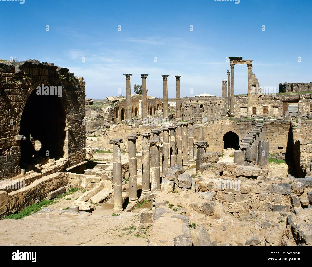 Syria, Bosra. Ruins of the Roman baths and the archaeological city ...