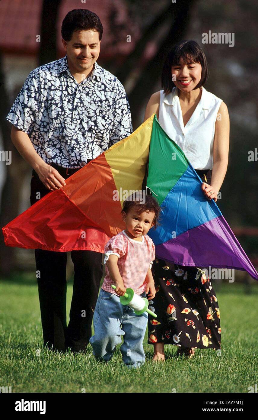Austin, Texas: Hispanic/Filipino couple spending time with 2-year-old ...