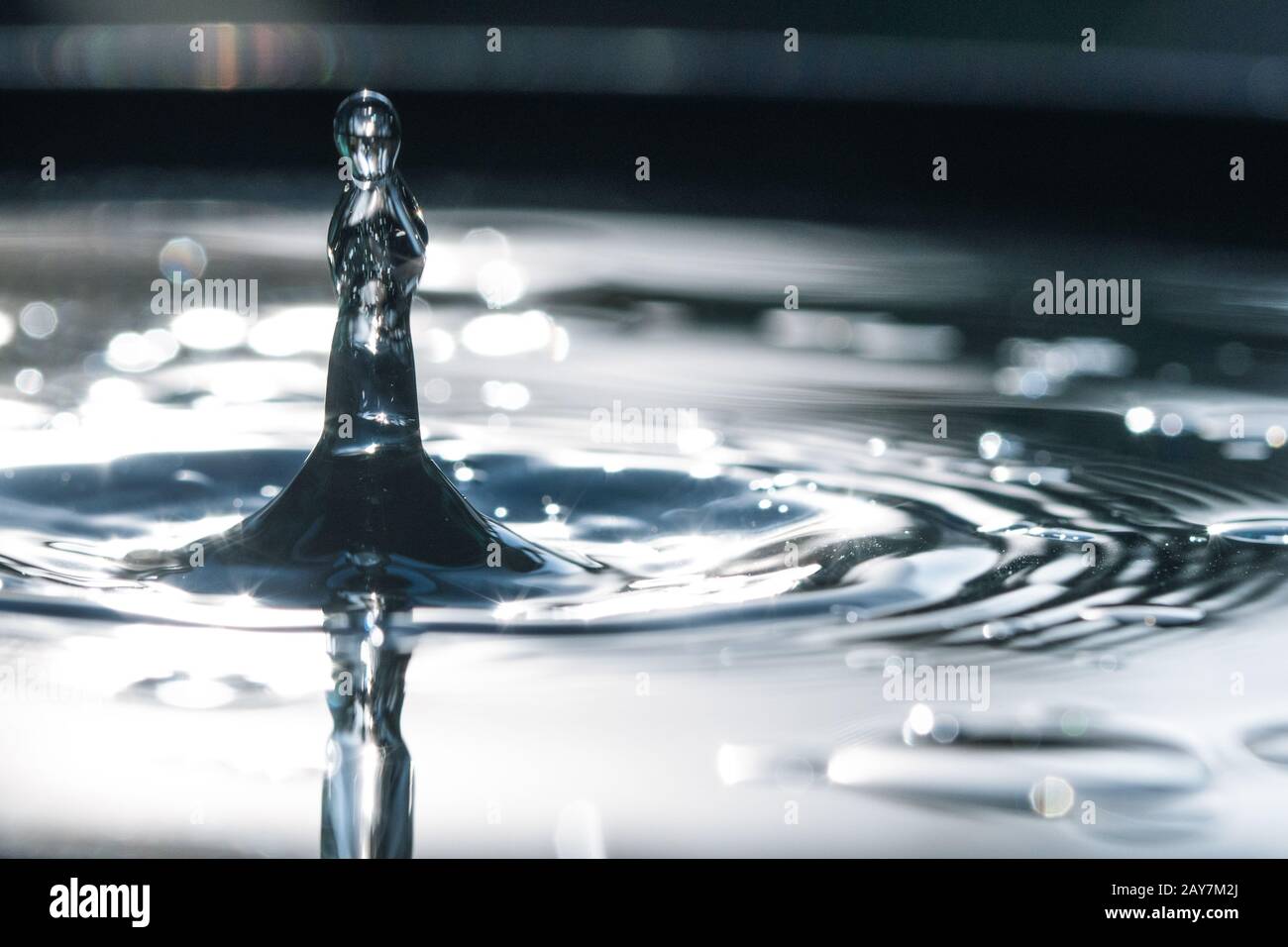 Water Drop splash with sun Stock Photo - Alamy