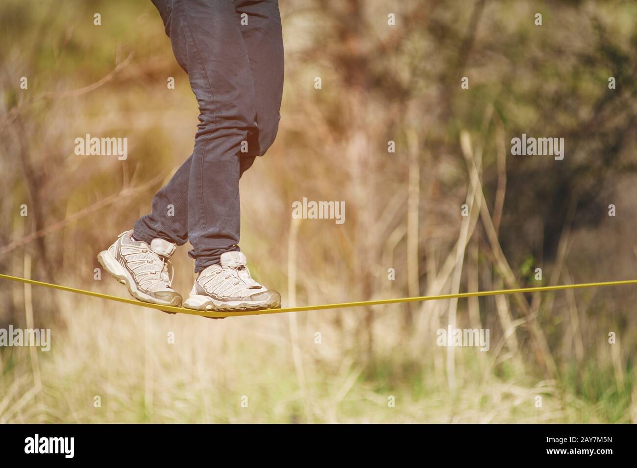 Slacklining is a practice of balancing, in which nylon or polyester ...