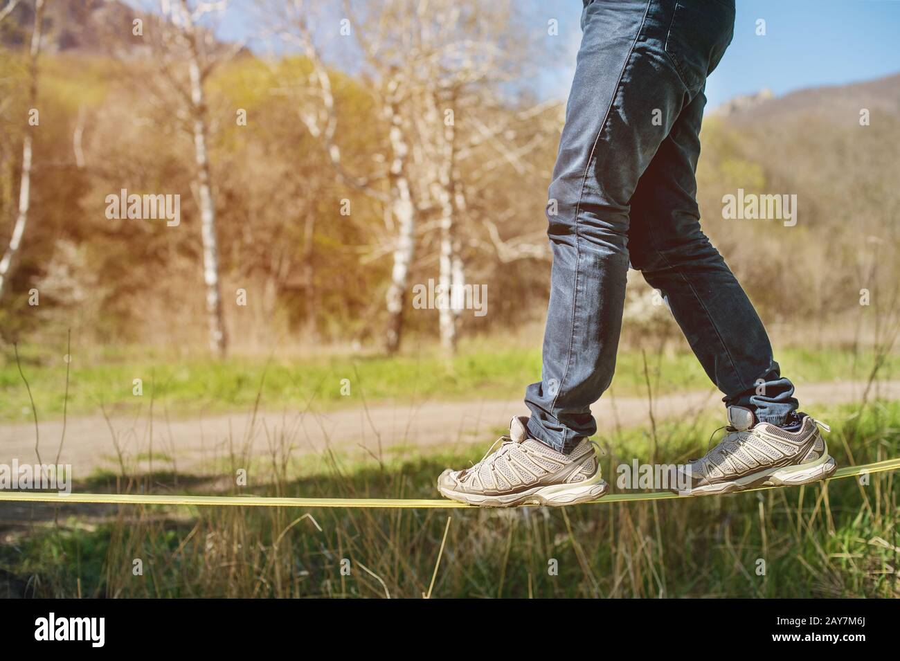 Slacklining is a practice of balancing, in which nylon or polyester ...