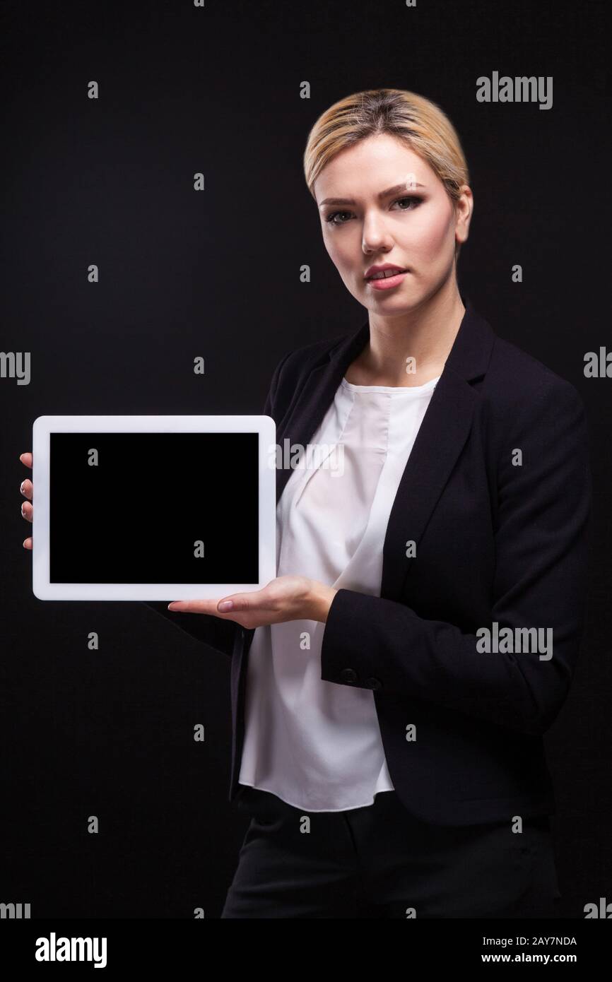 Pretty business lady with tablet Stock Photo - Alamy