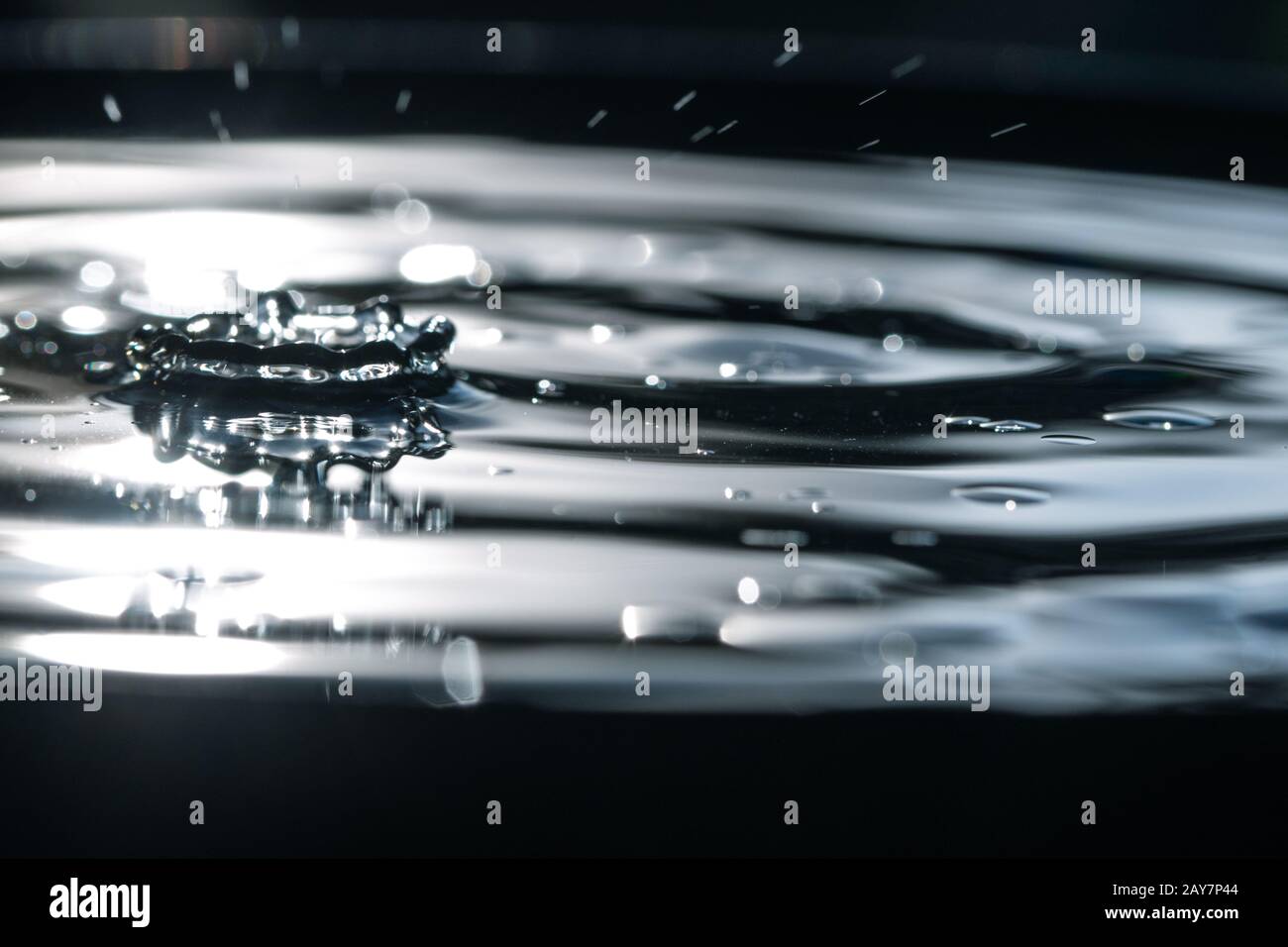 Water Drop splash with sun Stock Photo - Alamy