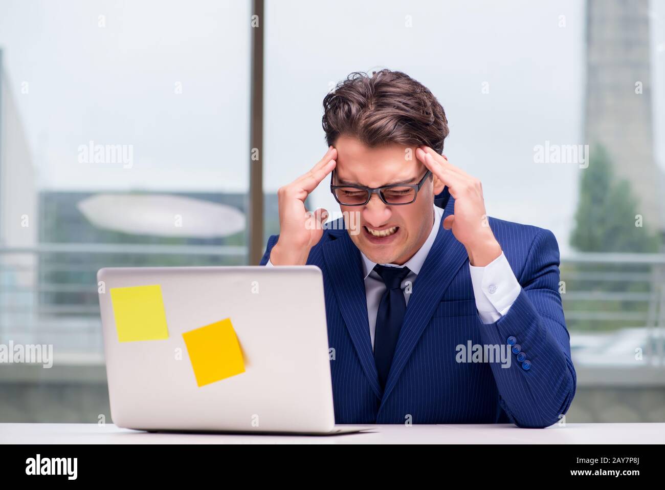 Workaholic businessman overworked with too much work in office Stock ...