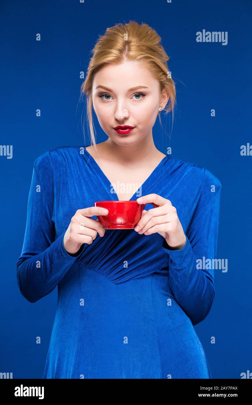 Girl with a cup Stock Photo - Alamy