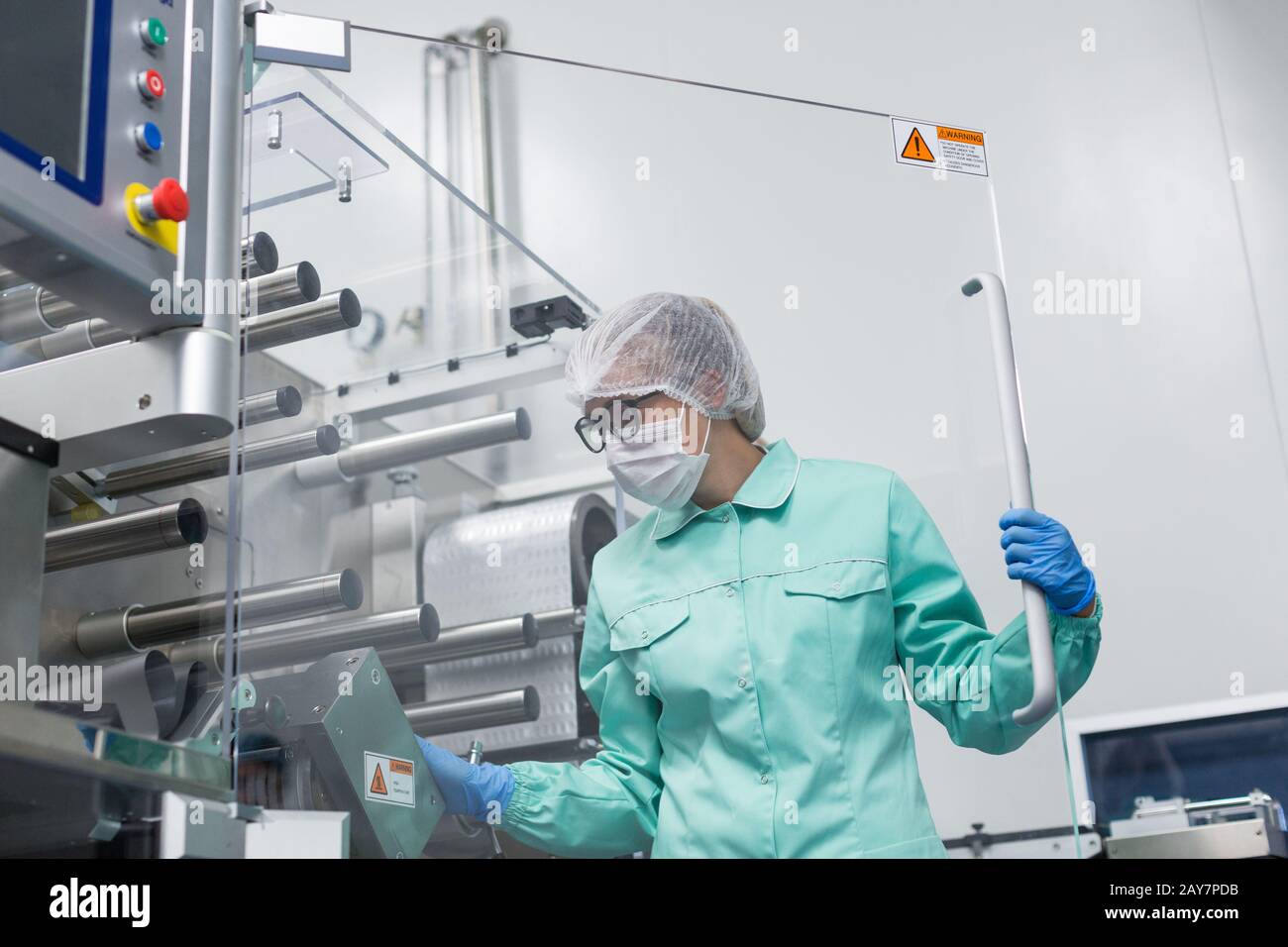 factory worker work with machine Stock Photo - Alamy