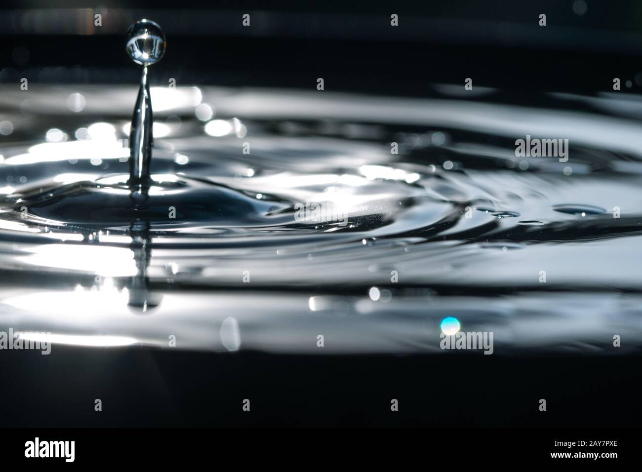 Water Drop splash with sun Stock Photo - Alamy
