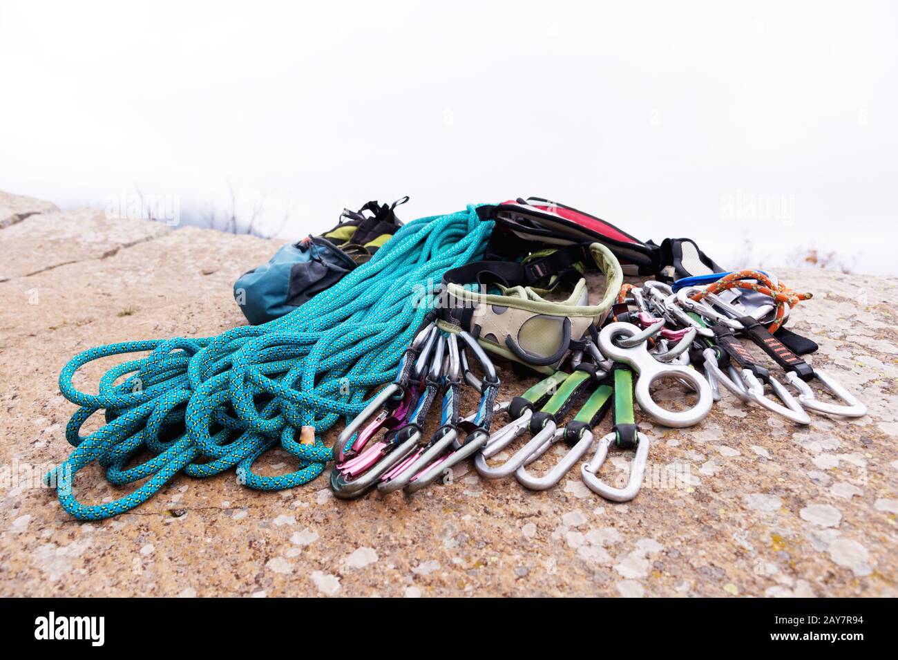 Climbing equipment - rope and carbines view from the side close-up. A ...