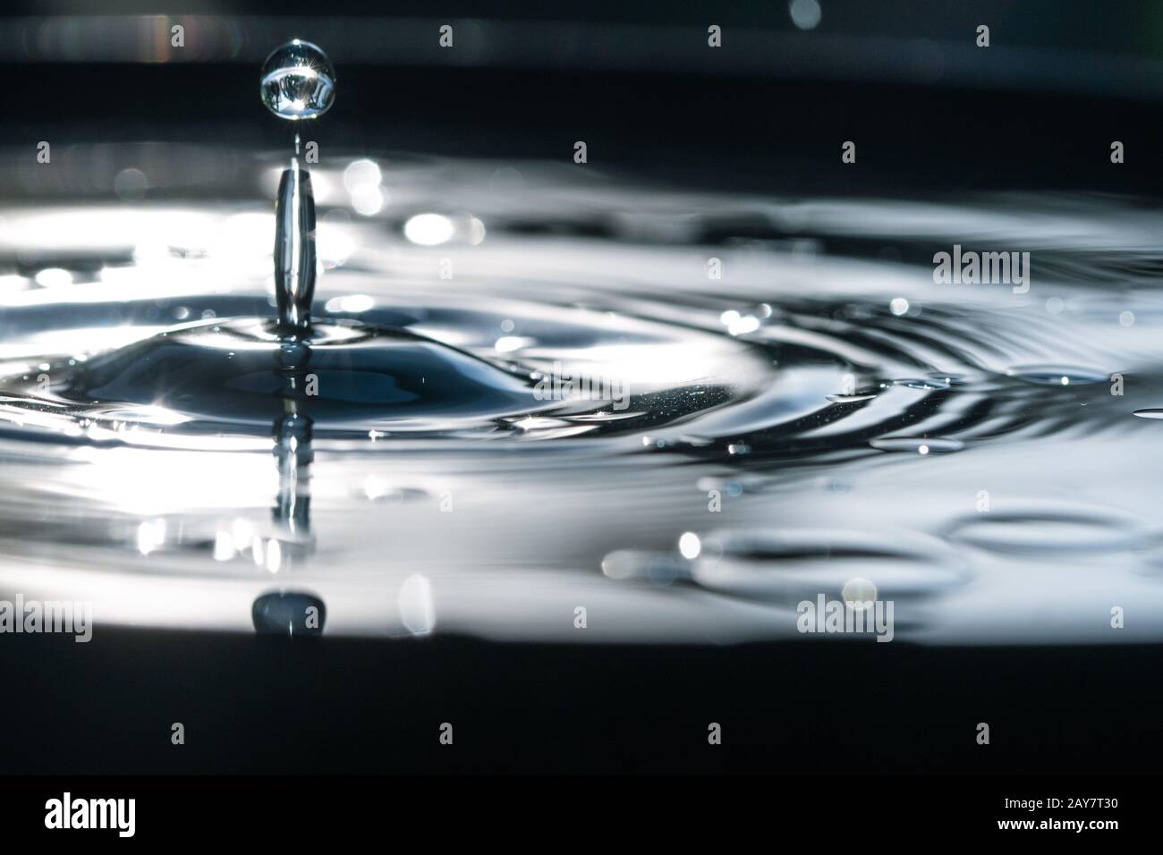 Water Drop splash with sun Stock Photo - Alamy