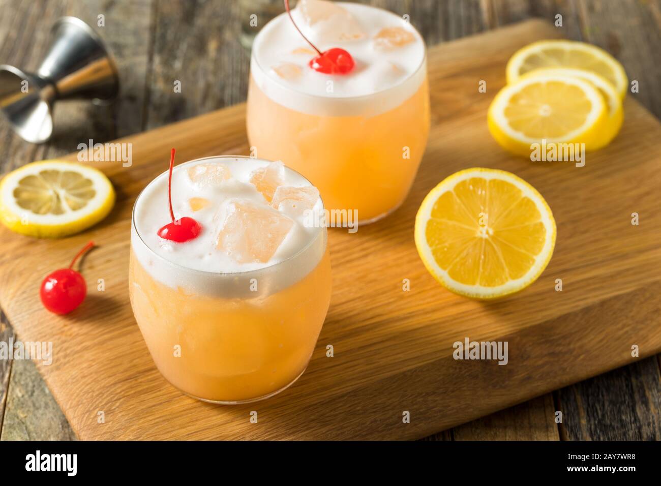 Refreshing Raki Vodka Sour Cocktail with a Cherry Stock Photo - Alamy
