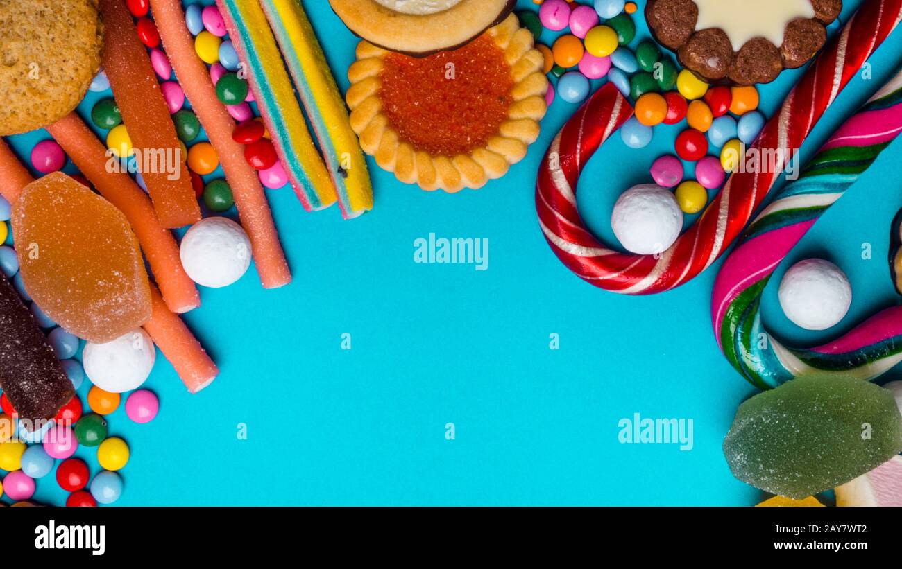 candy background, assortment of colorful candy, mixed unhealthy candies ...