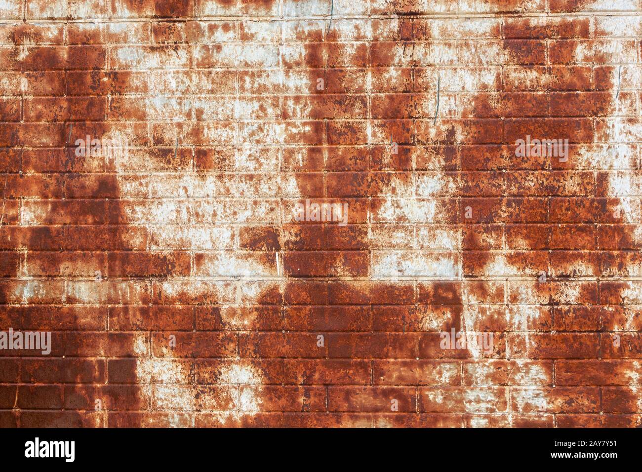 An old rusty red and orange toned brick wall background Stock Photo - Alamy