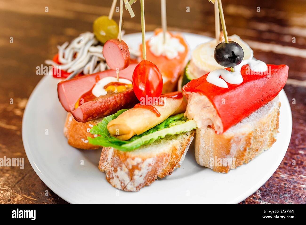 Spanish Tapas as traditional cuisine on vintage table in restaurant ...