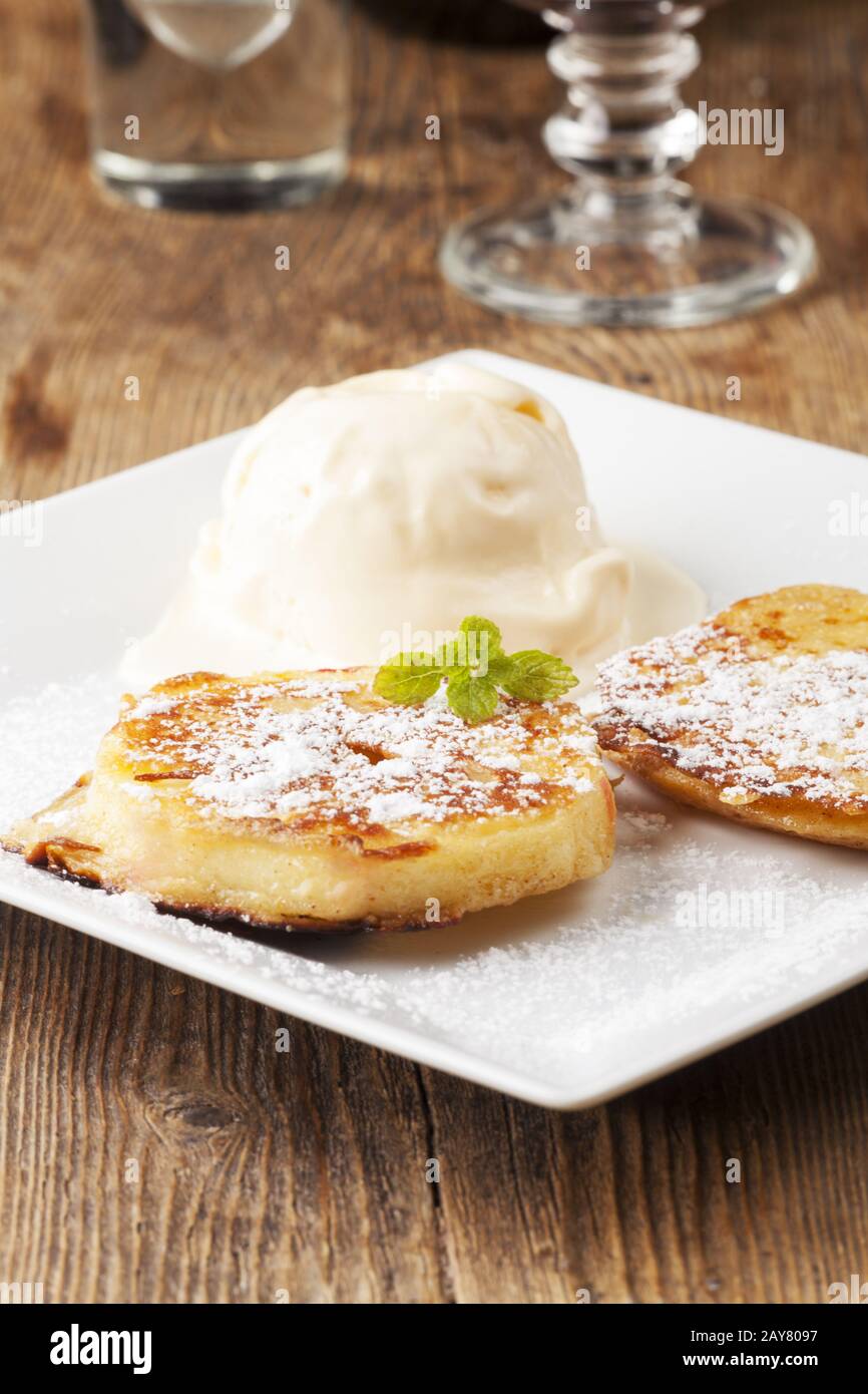 Austrian apple cake with vanilla ice cream Stock Photo - Alamy