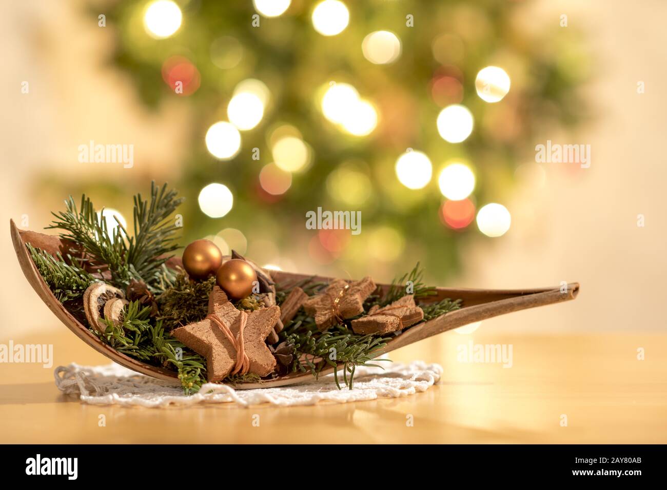 Christmas decoration in a nutshell in front of a Christmas tree with ...