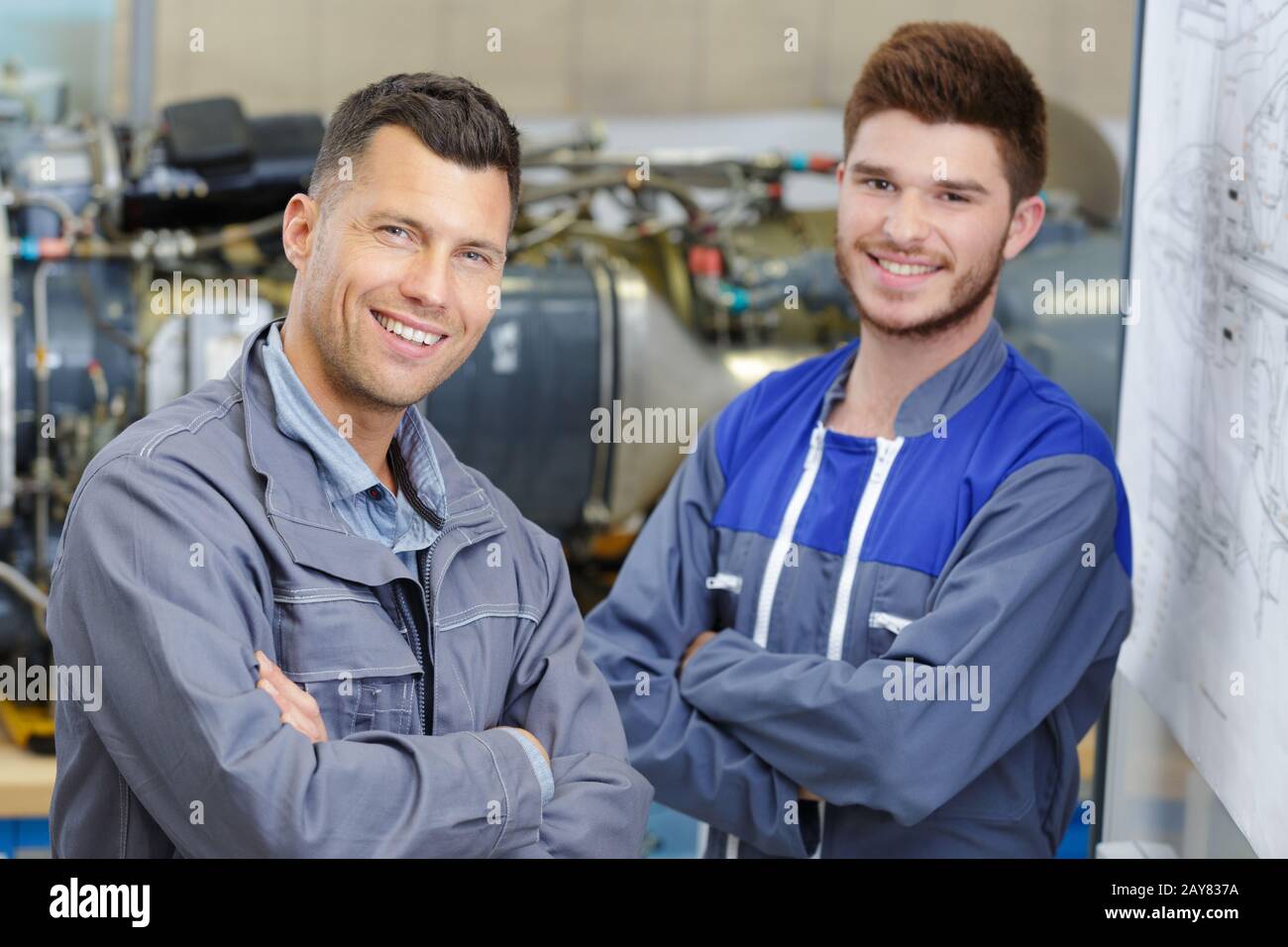 Mechanic in uniform cross hi-res stock photography and images - Alamy