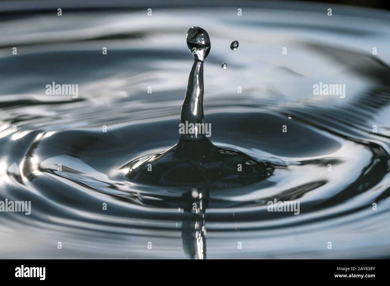 Water Drop splash with sun Stock Photo - Alamy