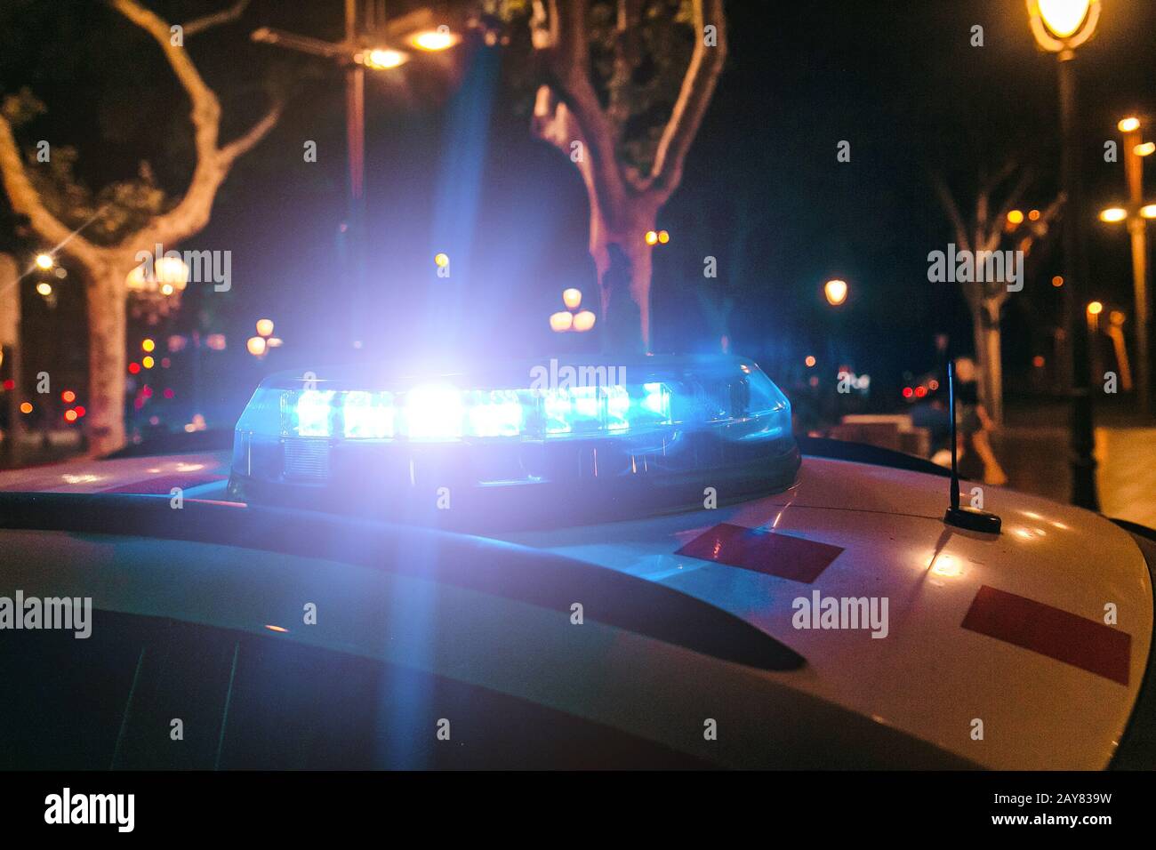 Police car with flash lights on the street at night Stock Photo - Alamy