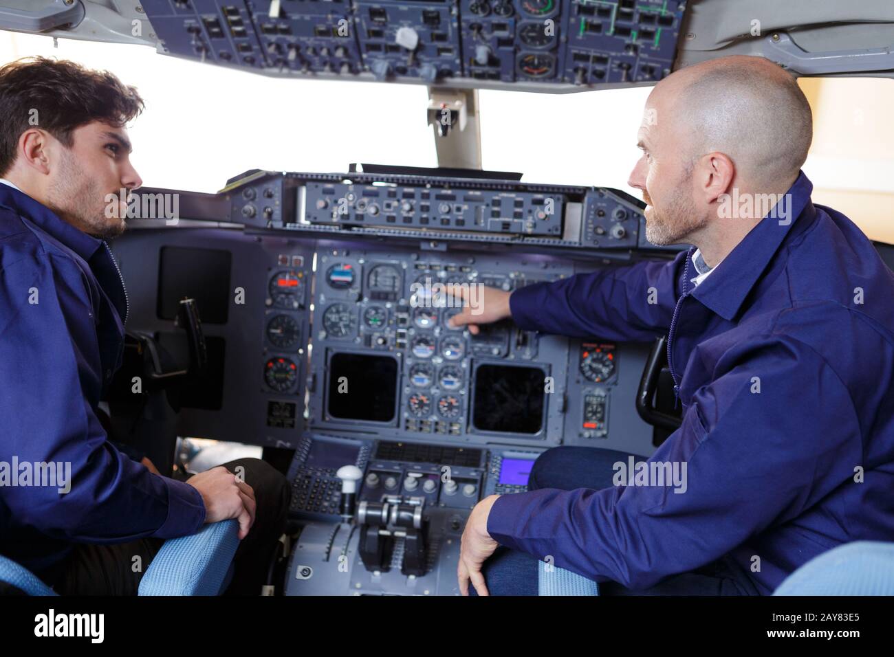 young man in training in aircraft cockpit Stock Photo - Alamy