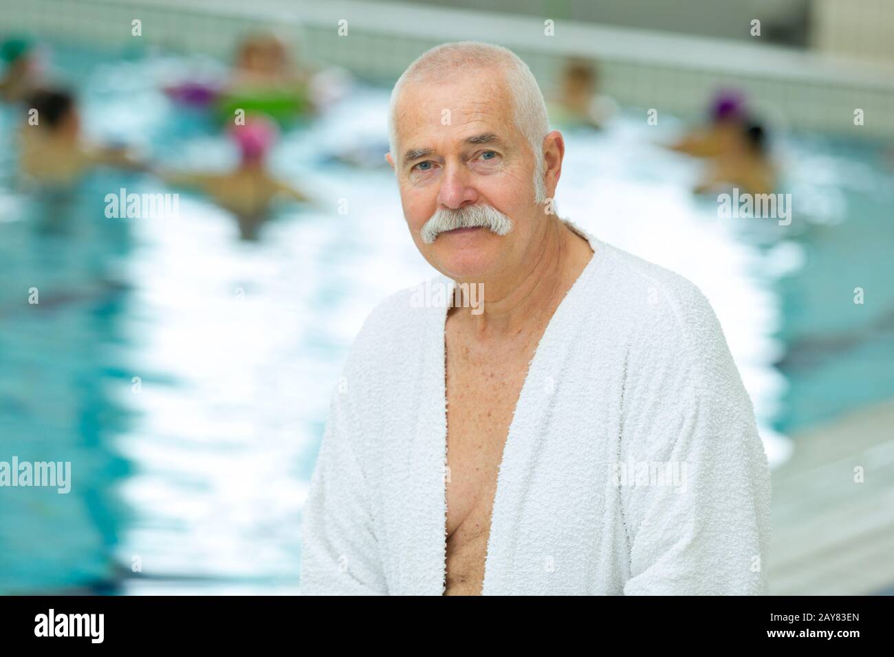 middle aged man in swimming pool Stock Photo - Alamy