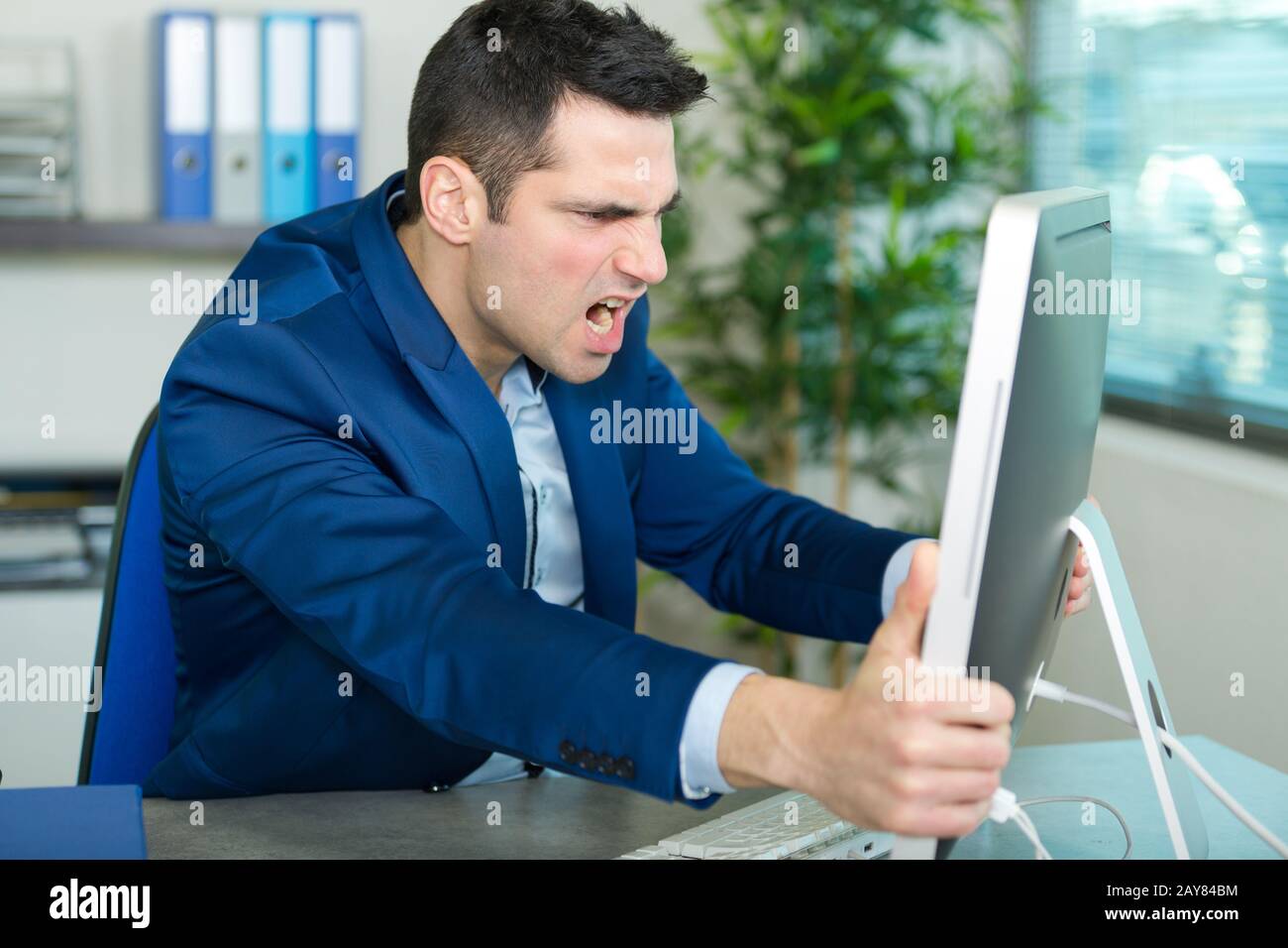 angry business man expressing frustration Stock Photo - Alamy