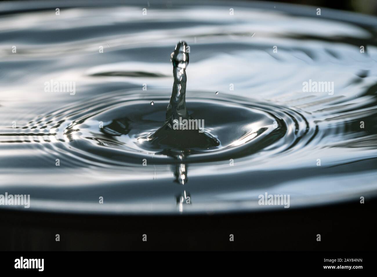 Water Drop splash with sun Stock Photo - Alamy