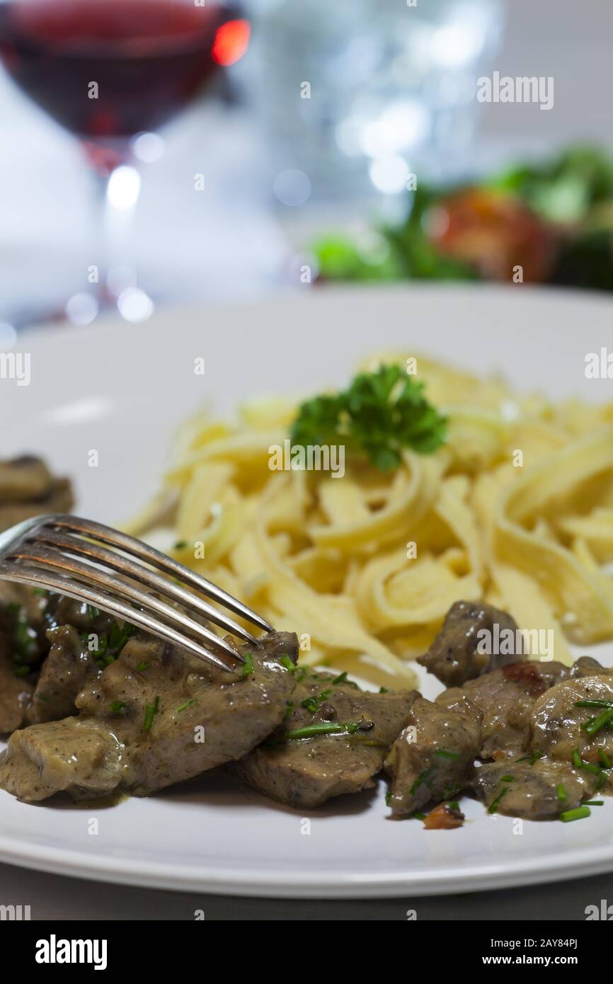 bavarian sliced meat with noodles Stock Photo - Alamy