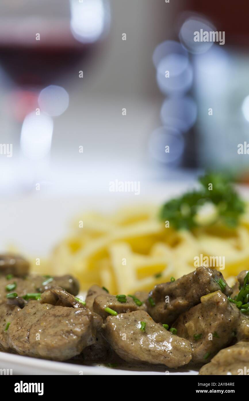 bavarian sliced meat with noodles Stock Photo - Alamy