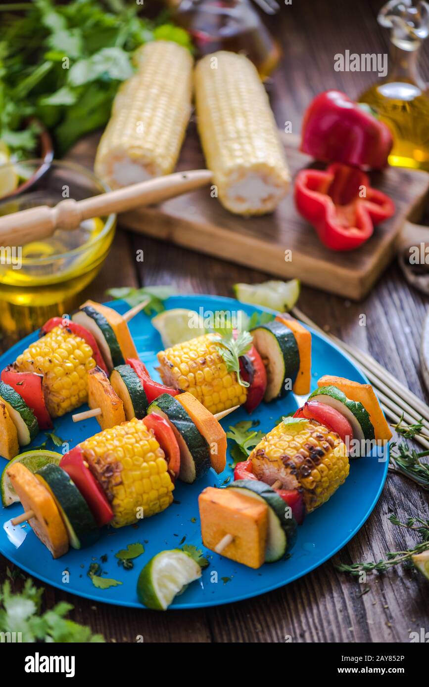 colourful garden bbq and grill party food on table Stock Photo - Alamy