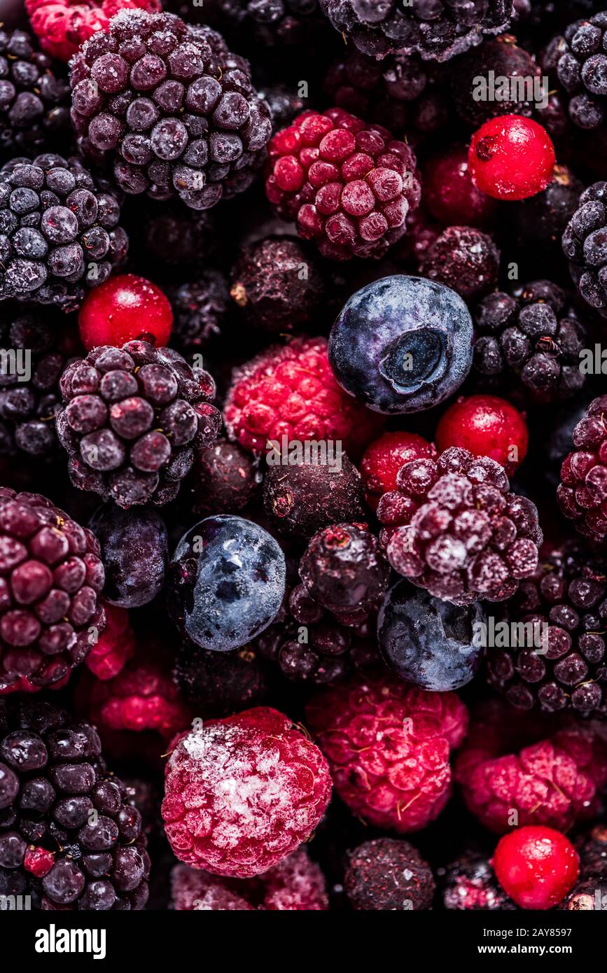 Frozen summer forest wild berries fruits, full frame background Stock ...