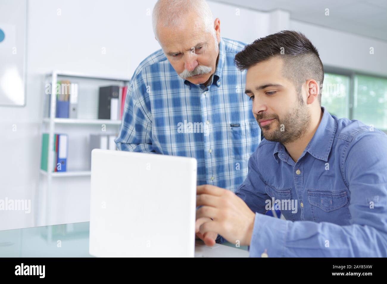 a young teacher with laptop Stock Photo - Alamy
