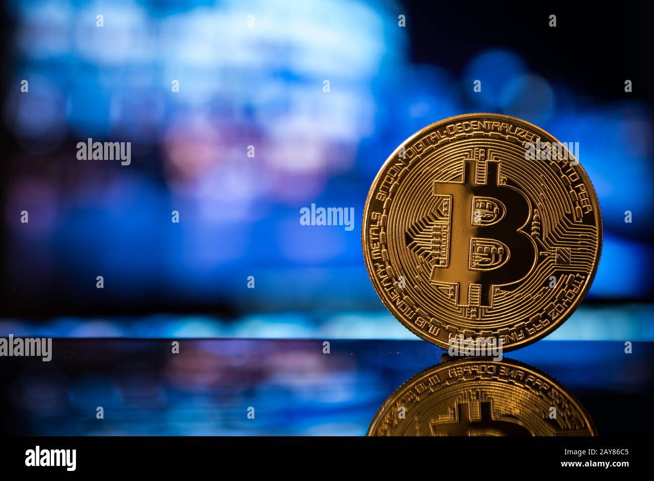 Bitcoin close up with blur copy space background Stock Photo - Alamy