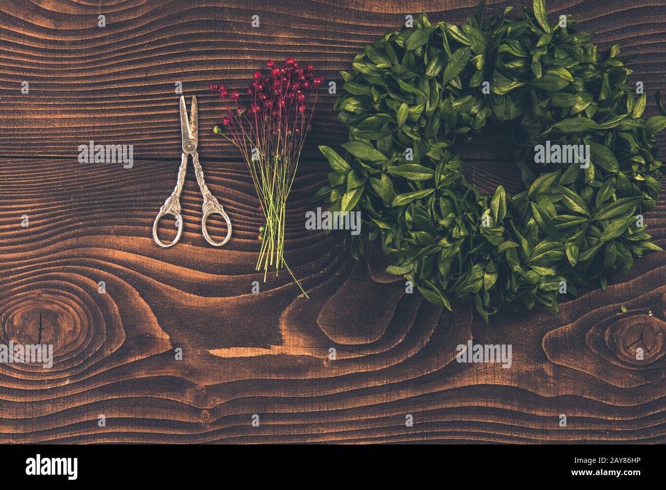 Tools and products for Christmas winter wreath Stock Photo - Alamy