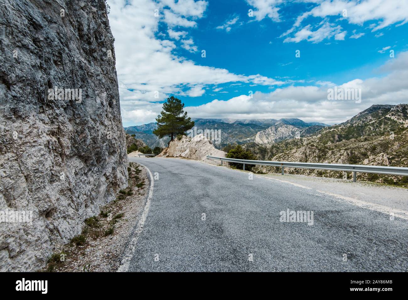 Empty road into mountains hi-res stock photography and images - Alamy