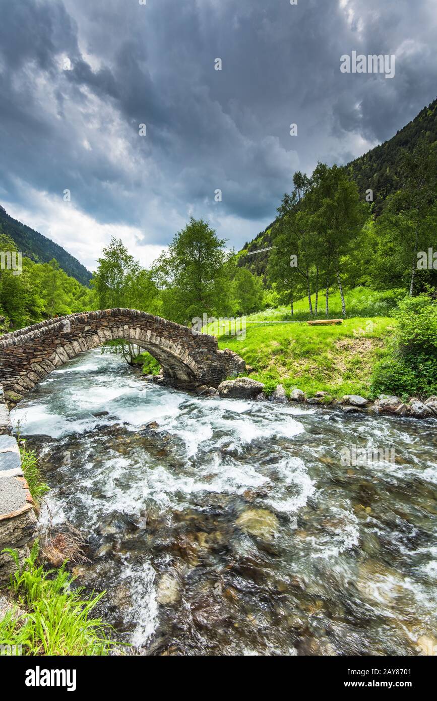 Dry stone medieval bridge in Andorra Stock Photo - Alamy
