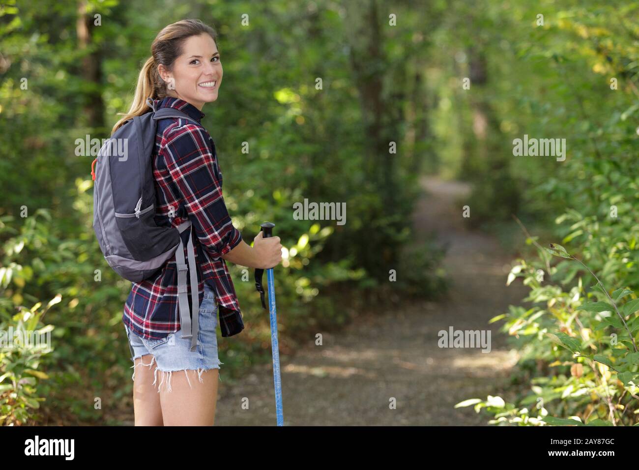 female walker on a nature path Stock Photo - Alamy