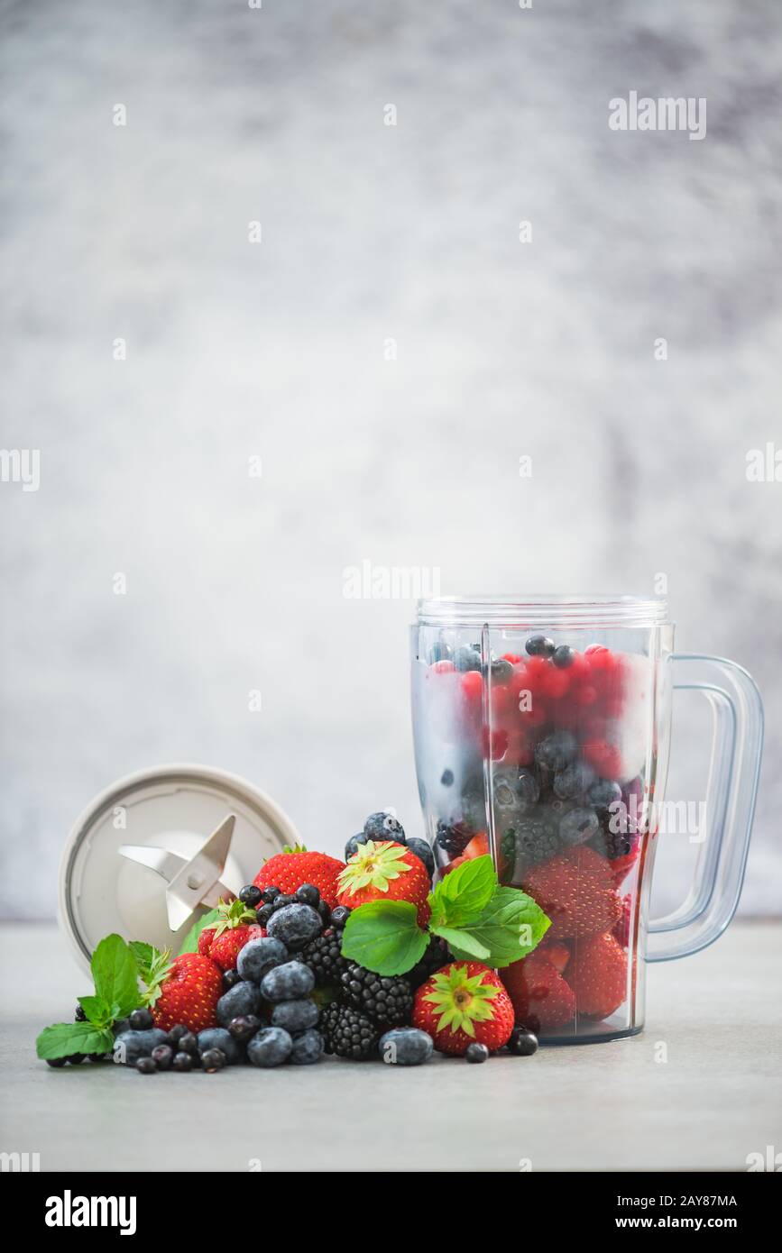 REcipe and ingredients for perfect berry smoothie Stock Photo - Alamy